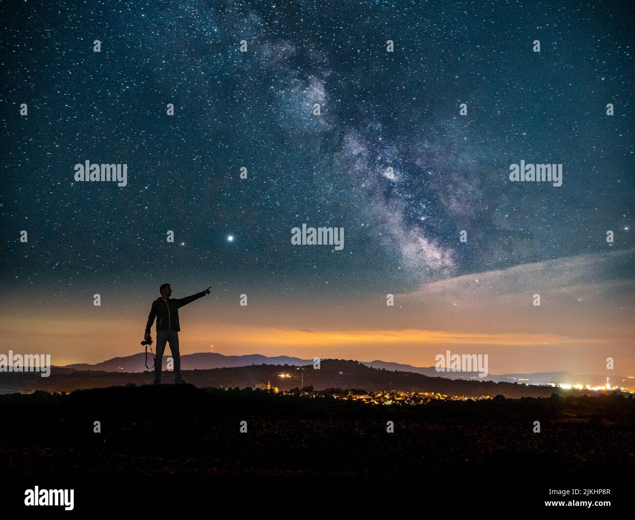 Silhouette pointing at sky hi-res stock photography and images - Alamy