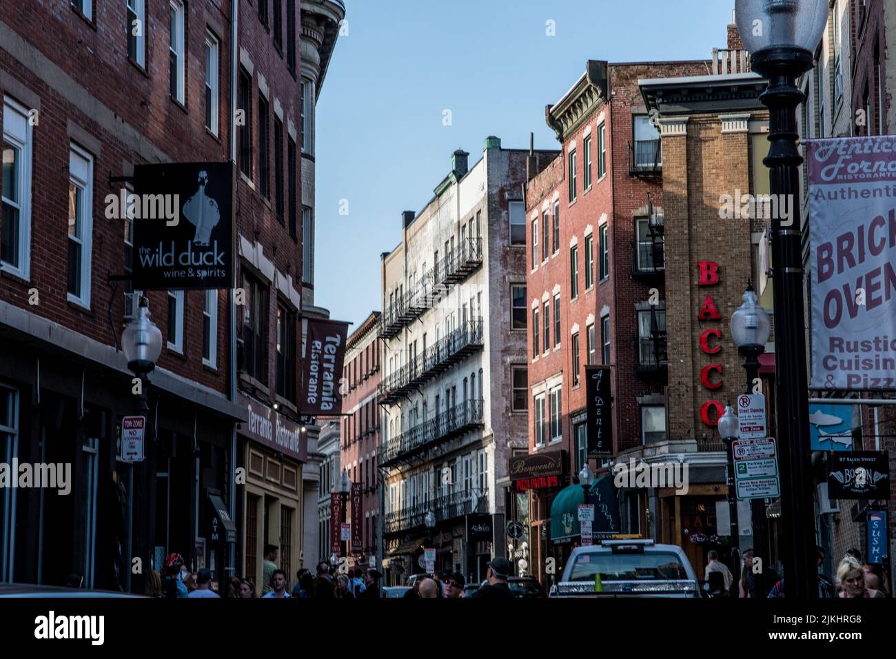 A beautiful shot of a street full with people in Boston Stock Photo - Alamy