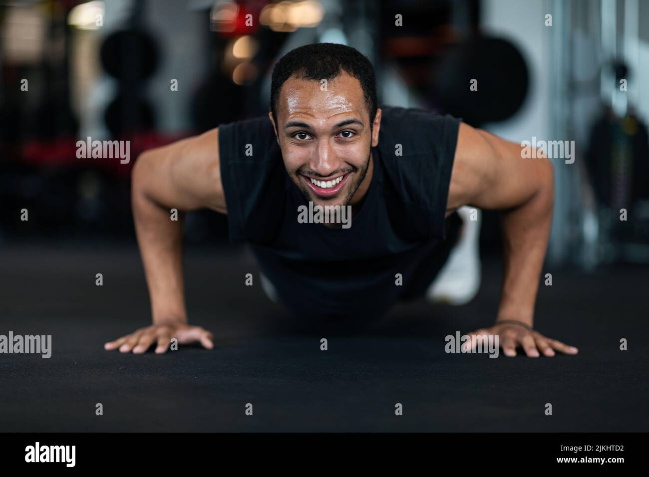 Smiling Handsome Black Man Making Push Up Exercises While Training At ...