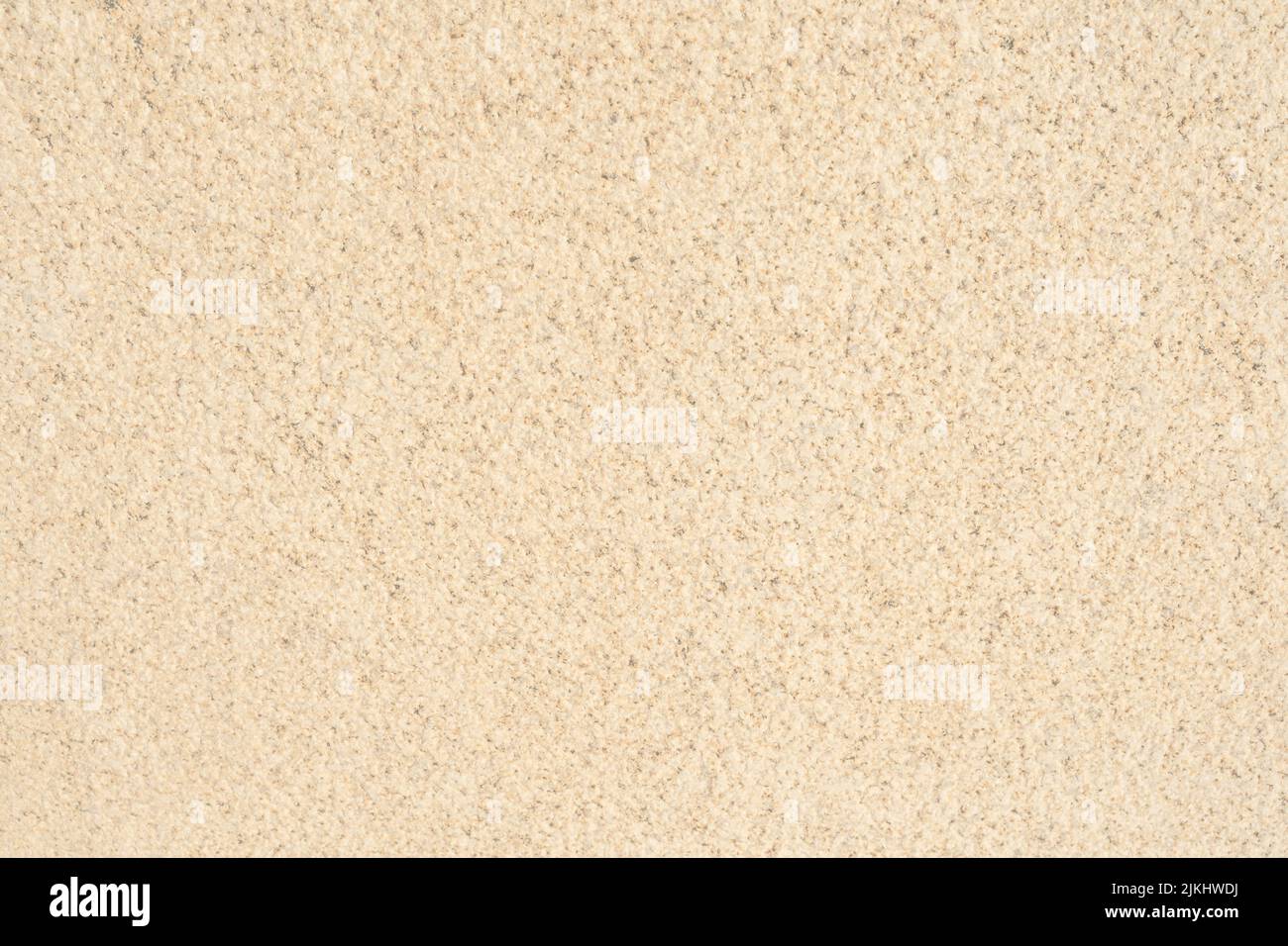 A cream colored sandy texture background Stock Photo - Alamy