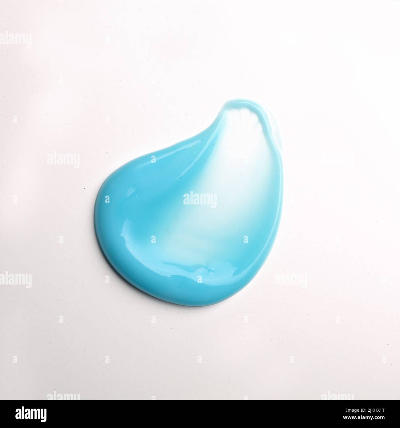 A pale blue shiny skin care product texture swat Stock Photo - Alamy