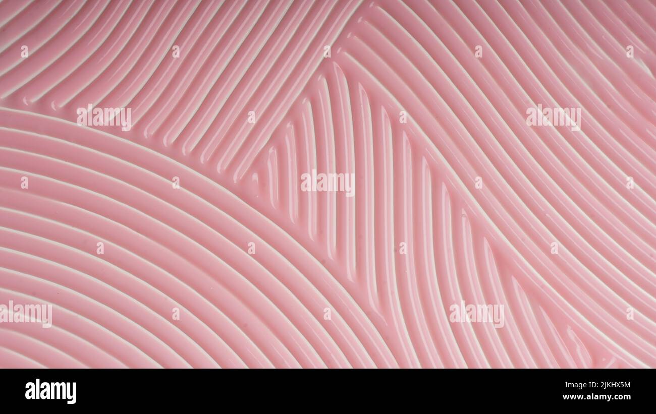 A pink skin care product wavy texture swat Stock Photo - Alamy