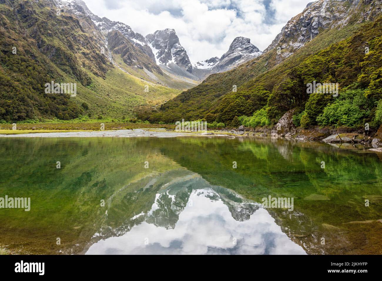 Tranquil mountain lake Mackenzie at the famous Routeburn Track ...