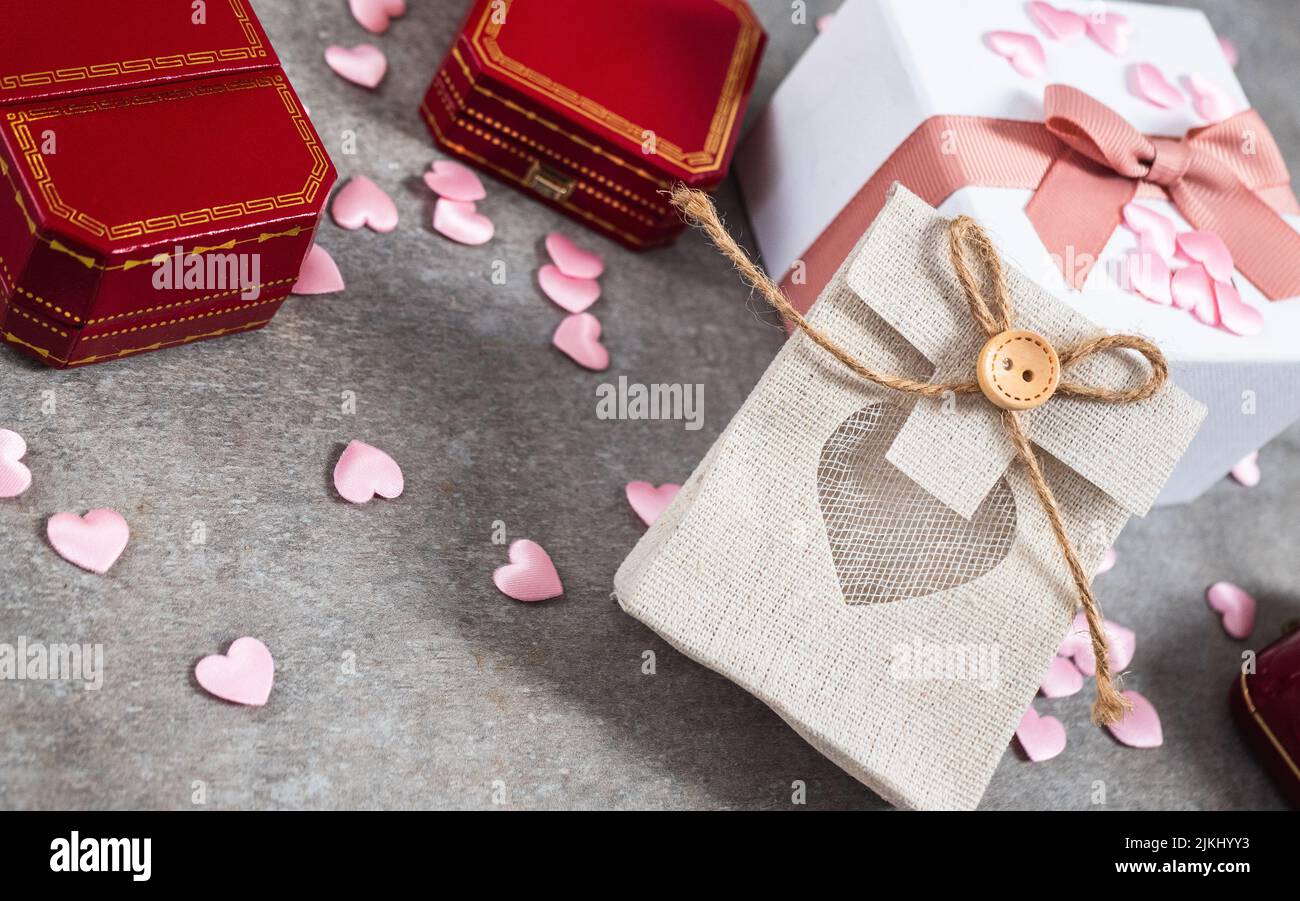 Valentine's day background with hearts, gift box, champagne. Against ...