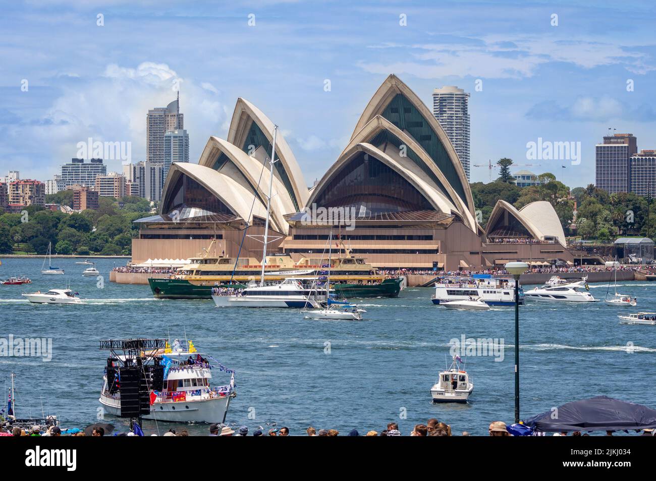 A beautiful view of boats and ships at the harbor near the Sidney Opera ...