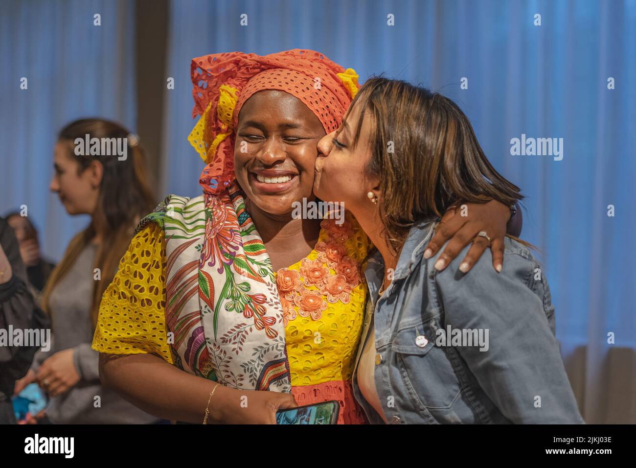 Group of women celebrating Women's day together indoors Stock Photo - Alamy