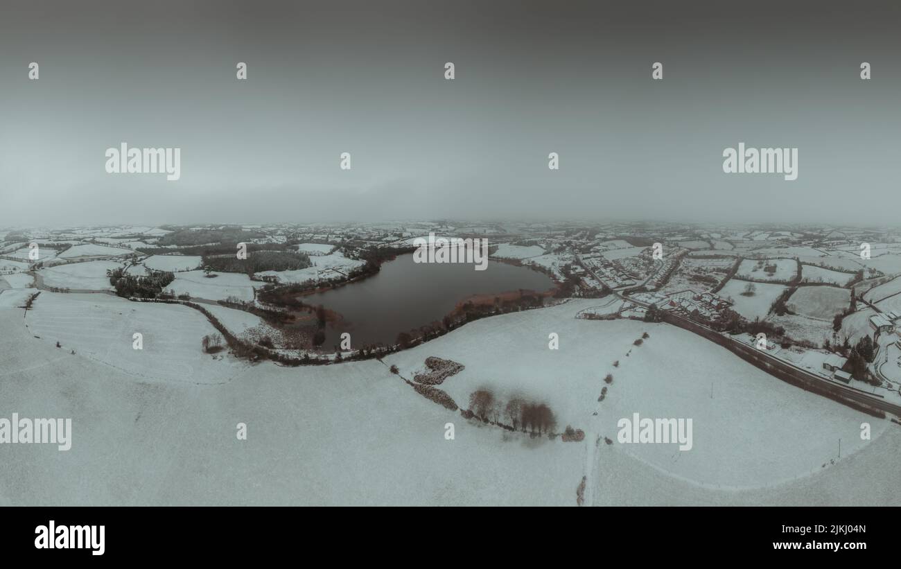An aerial drone shot of Ballybay, County Monaghan, Ireland, covered in ...