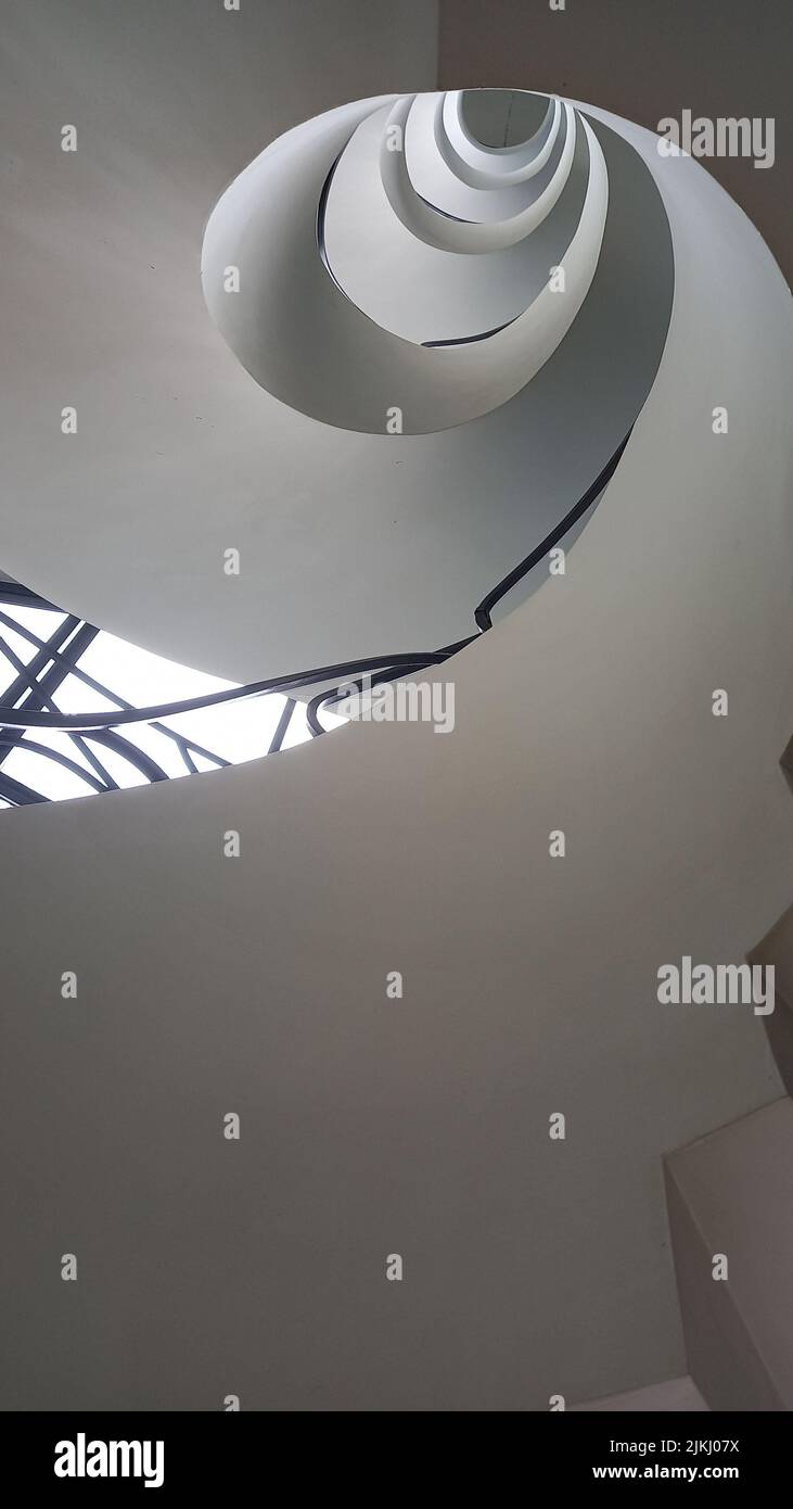 A low angle view of modern spiral building design Stock Photo - Alamy
