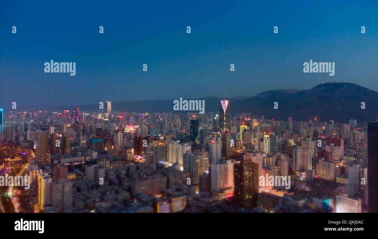 An aerial view of a night sky over the skyline of Lanzhou, China Stock ...