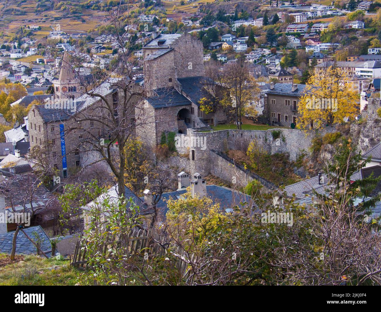 An aerial view of stone buildings and trees in Sion, Switzerland Stock ...