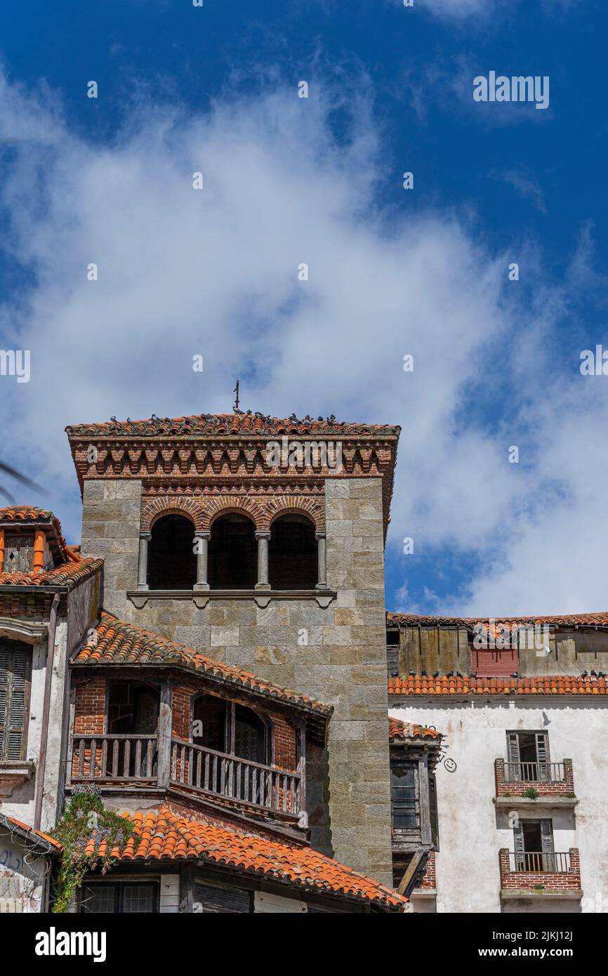 A vertical shot of a Beautiful ruined Florentine style building against ...