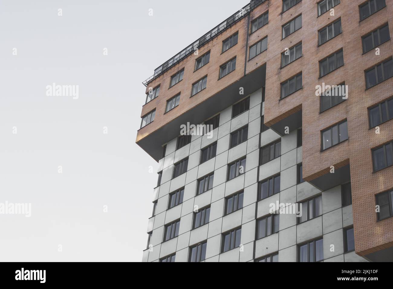 A low angle shot of of the facade of a modern building Stock Photo - Alamy