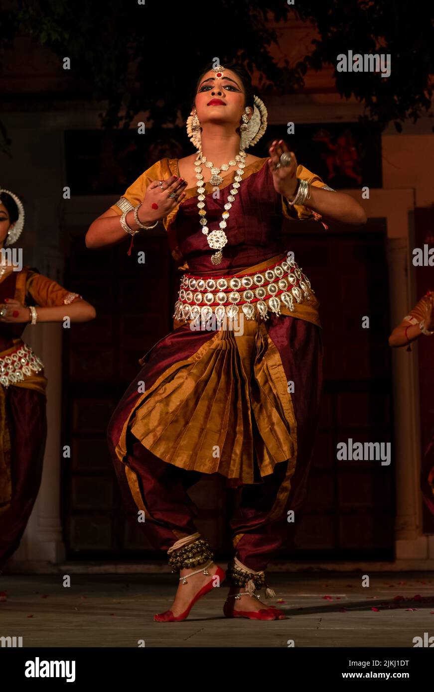 A photo of a young Indian female artist performing Indian classical ...