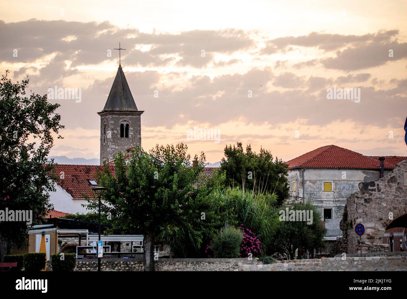 The bell tower of the parish church of St. Anselmus in Nin, Croatia at ...