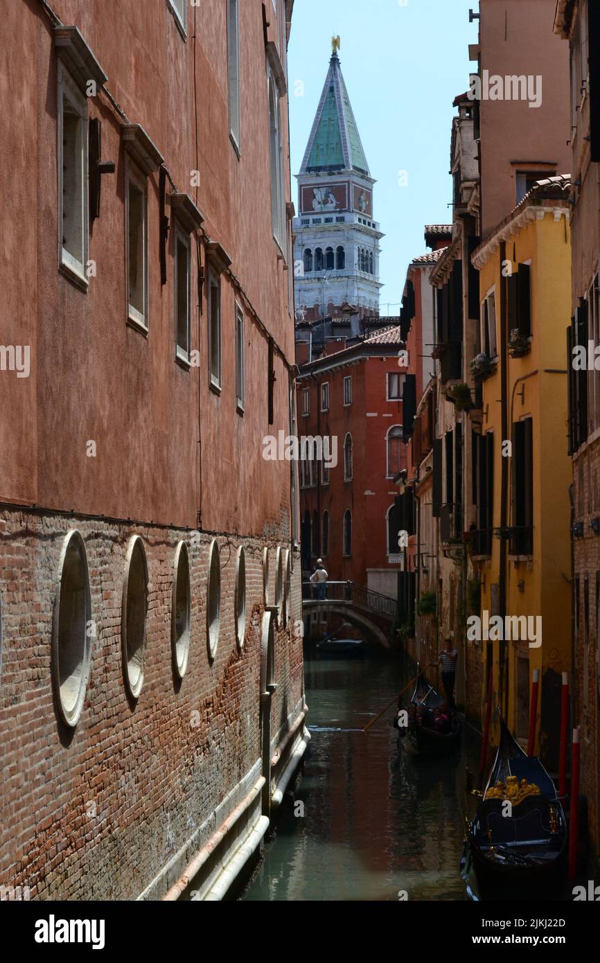 A beautiful view of the flowing canal surrounded by the traditional ...