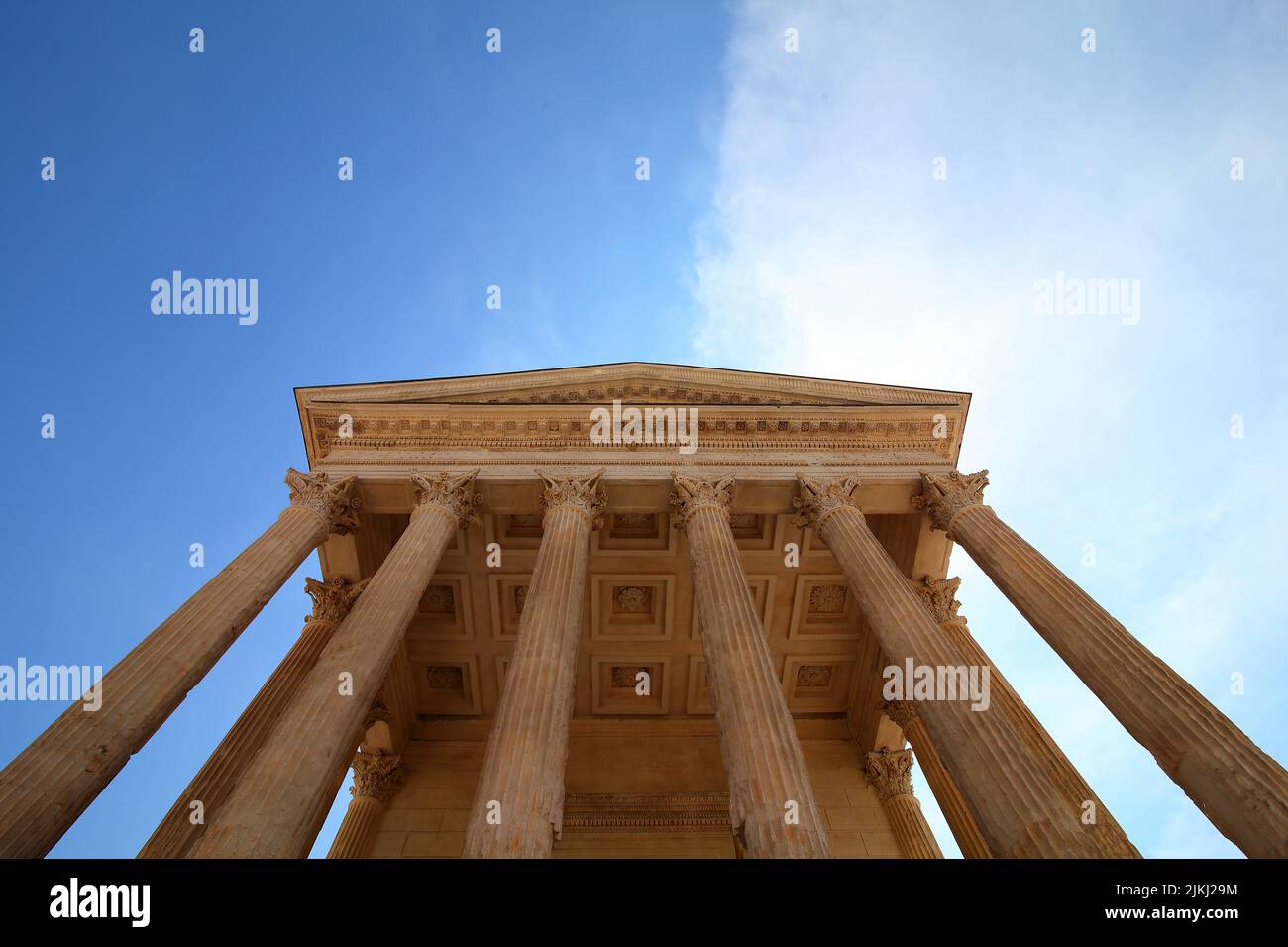 The Maison carree is a six columned portico with the facade of a ...