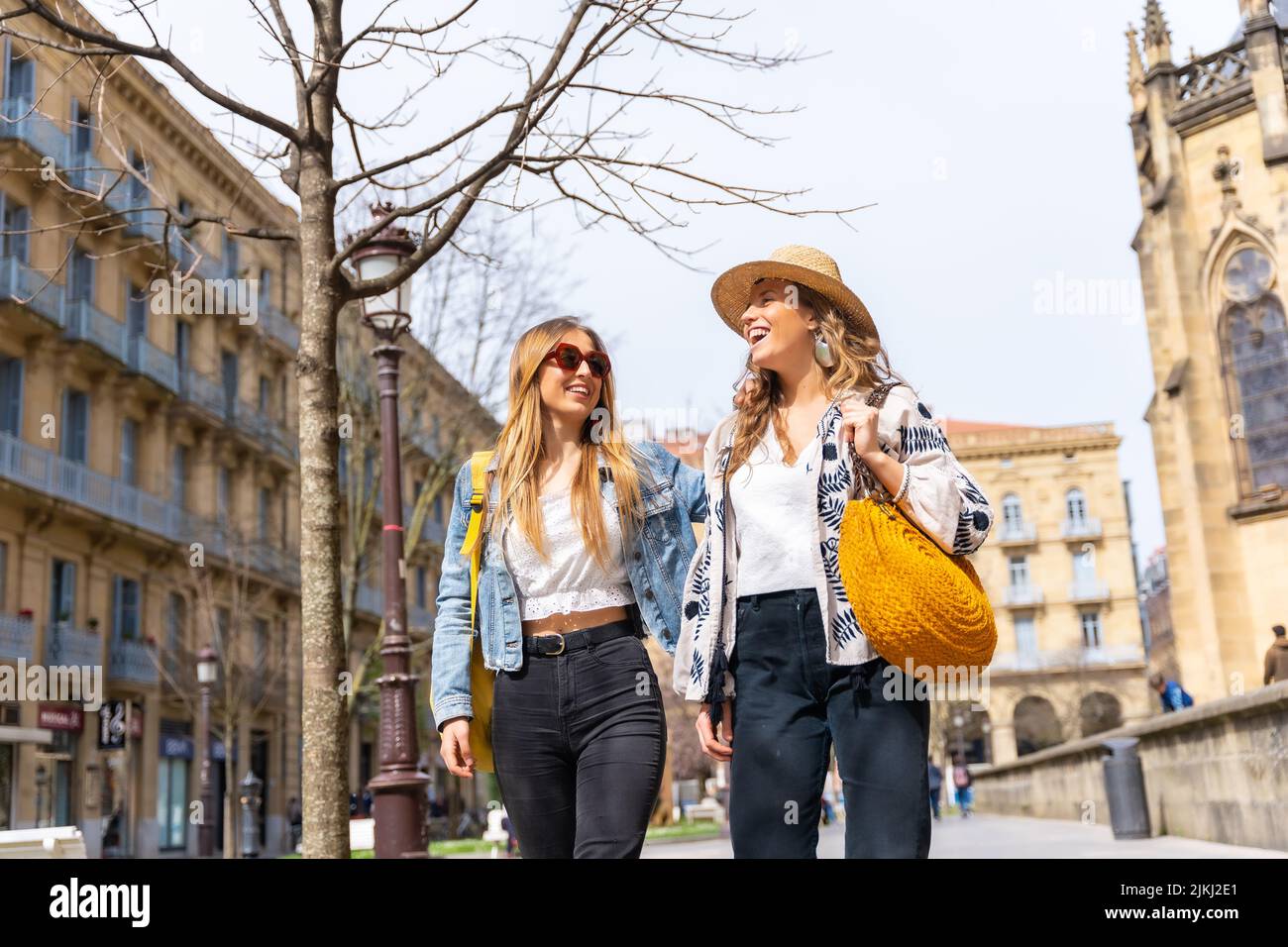 Lifestyle of tourist friends on vacation in the city, walking through ...