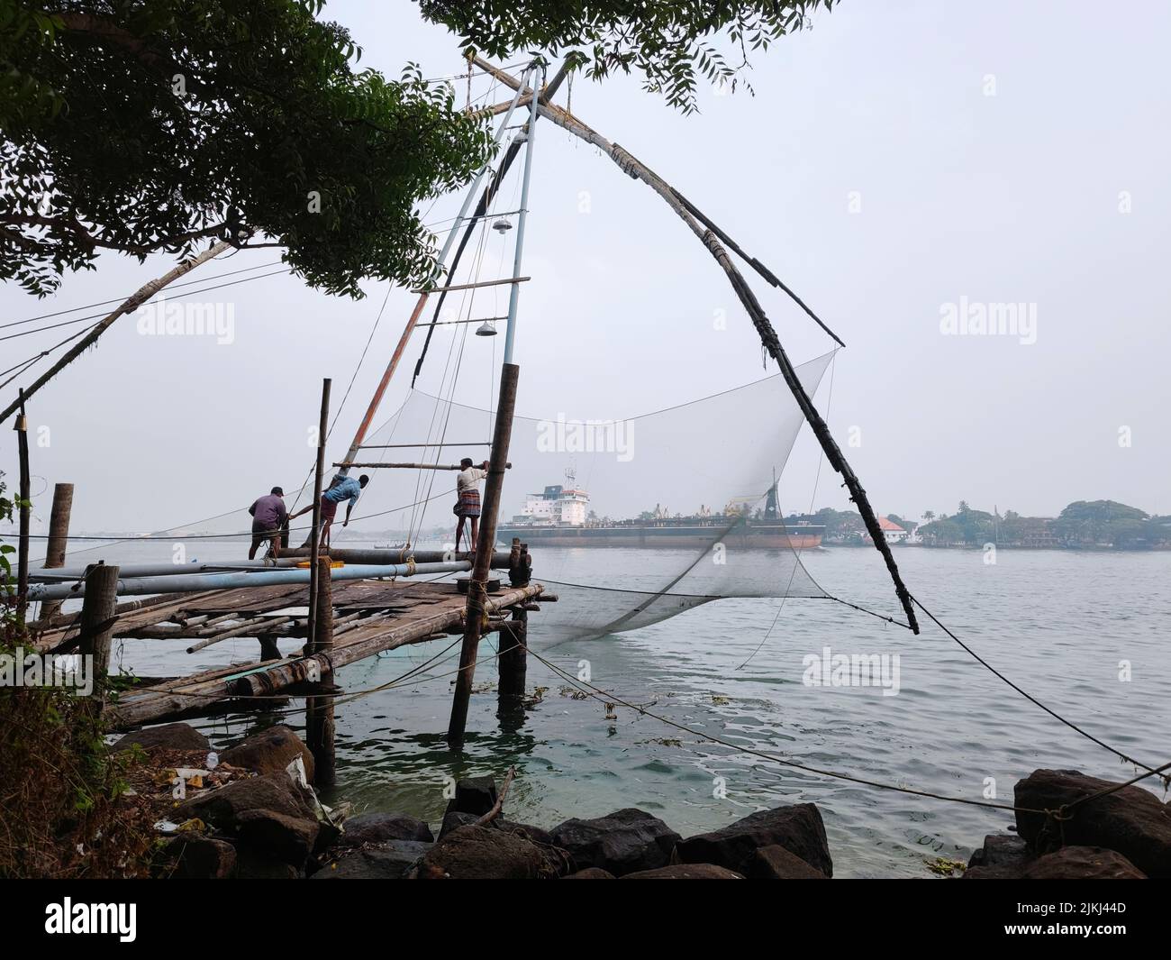 A beautiful shot of a Chinese fishing net ready to be used during ...
