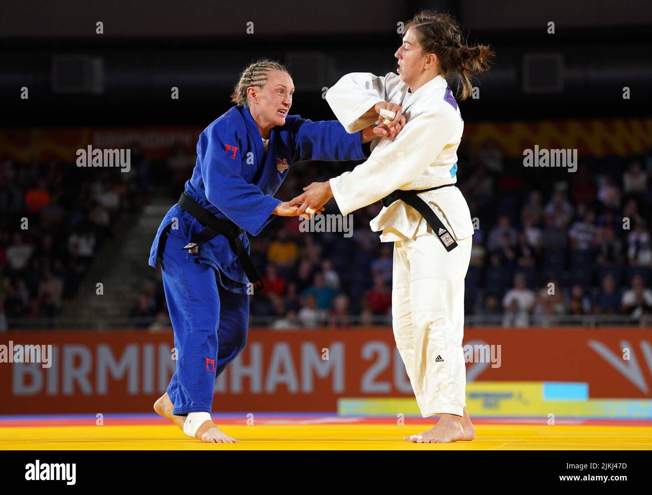 England's Gemma Howell (left) against Canada's Catherine Beauchemin ...