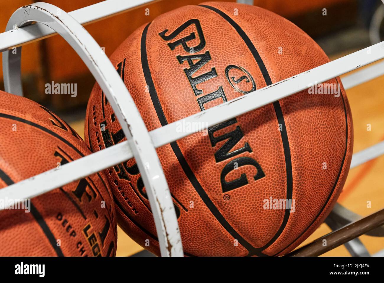 The Basketballs in a rack at a high school basketball game Stock Photo ...