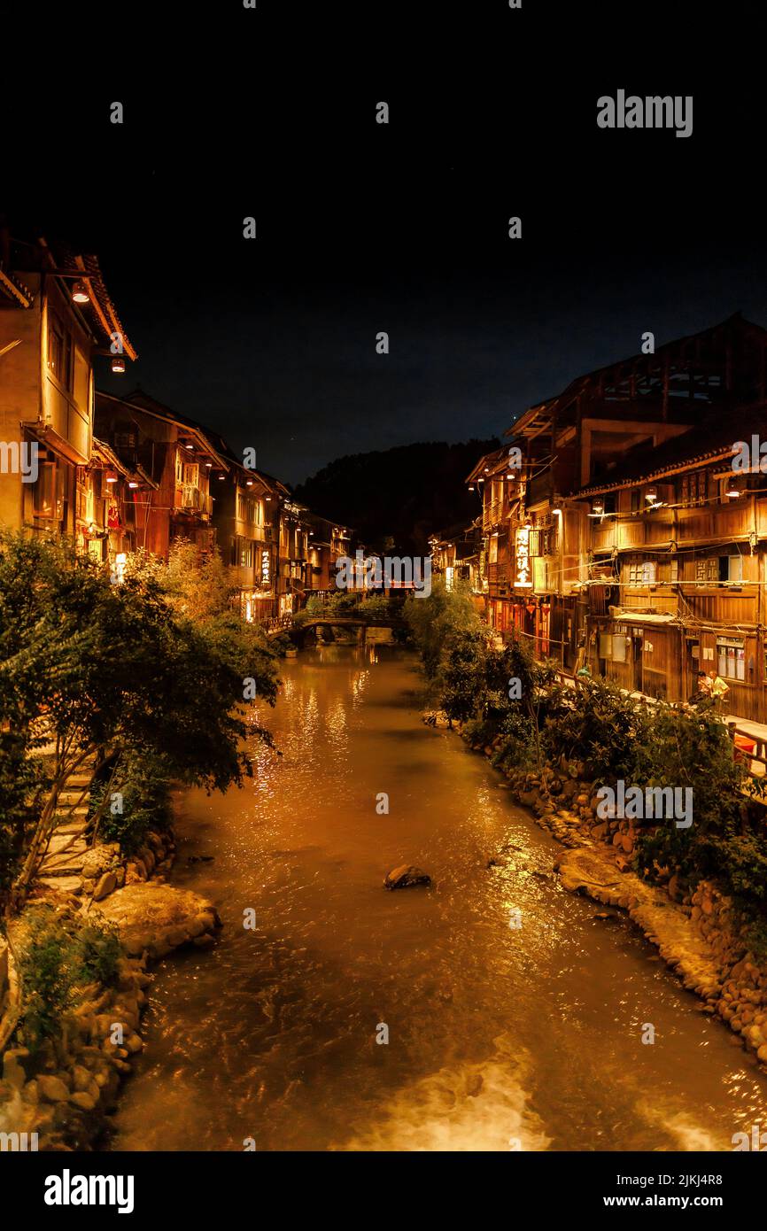 A beautiful shot of the old traditional houses in Langde Miao Ethnic ...