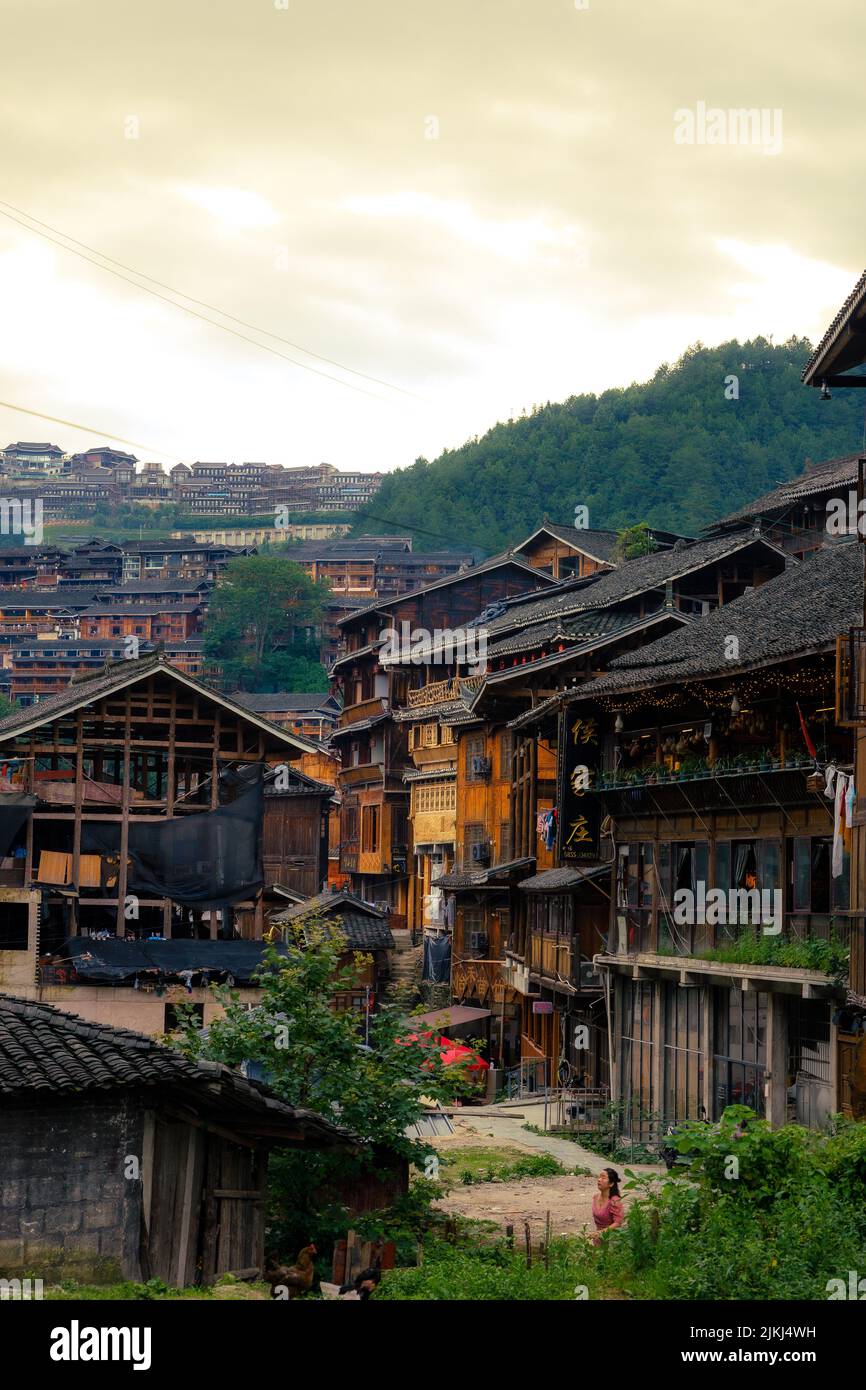 A beautiful shot of the old traditional houses in Langde Miao Ethnic ...