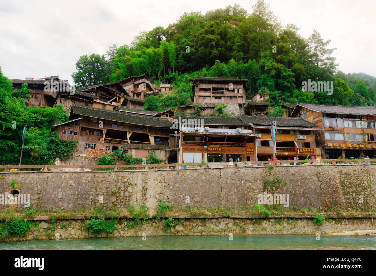 A beautiful shot of the old traditional houses in Langde Miao Ethnic ...