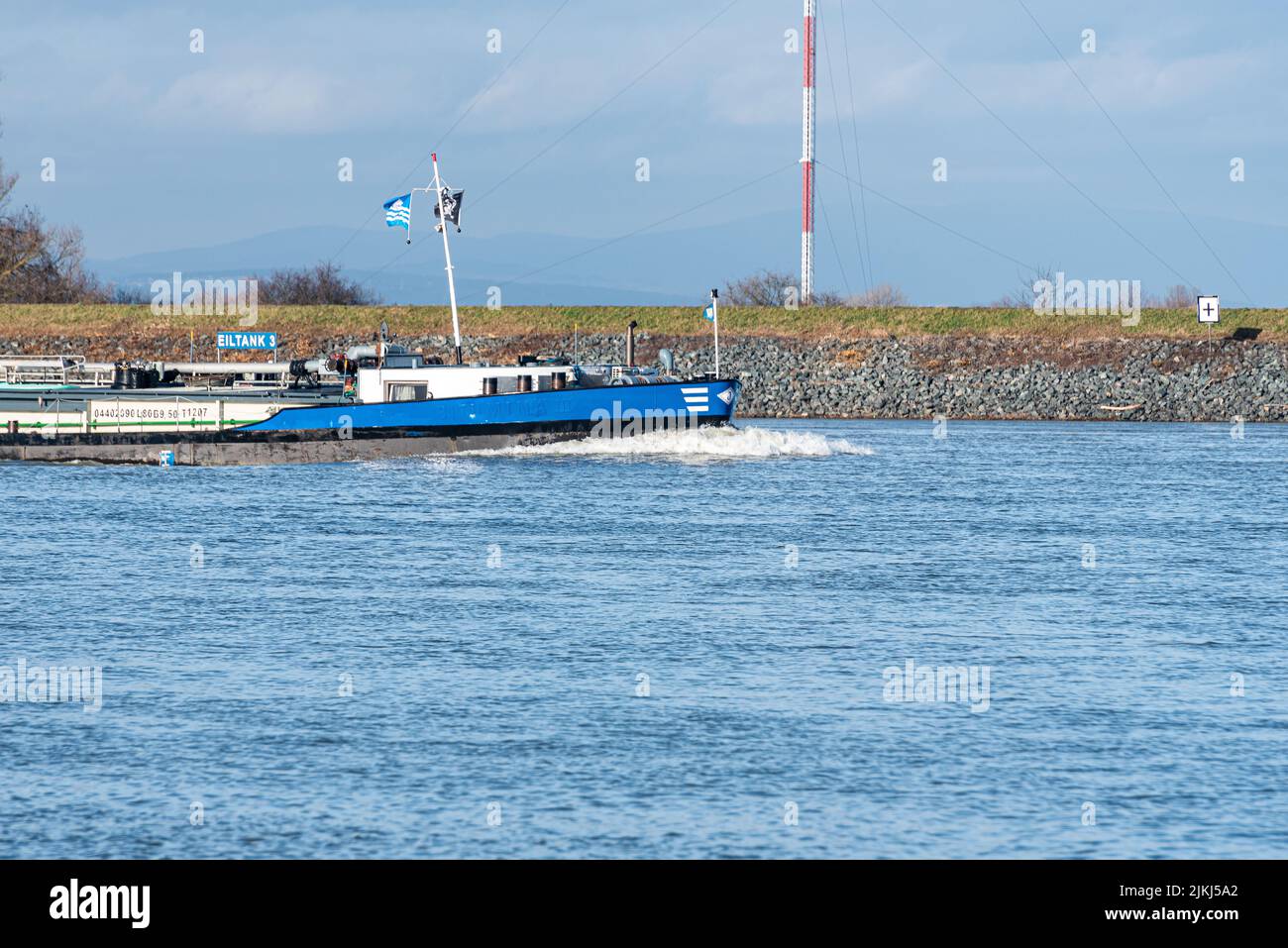 A beautiful shot of the cargo ships on the Rhine river near Oppenheim ...