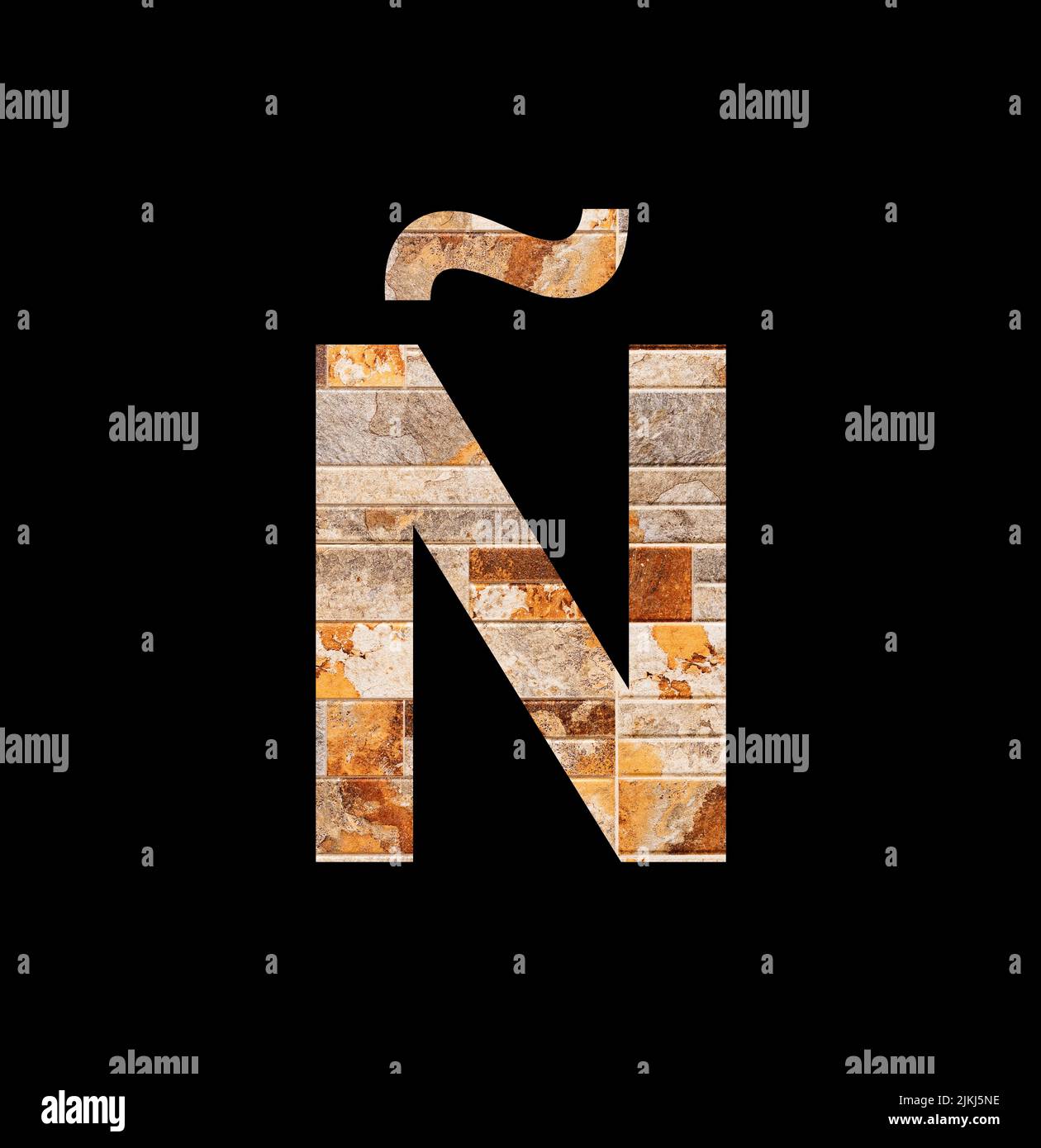 Alphabet letter Ñ on tile background - Veneer texture Stock Photo - Alamy