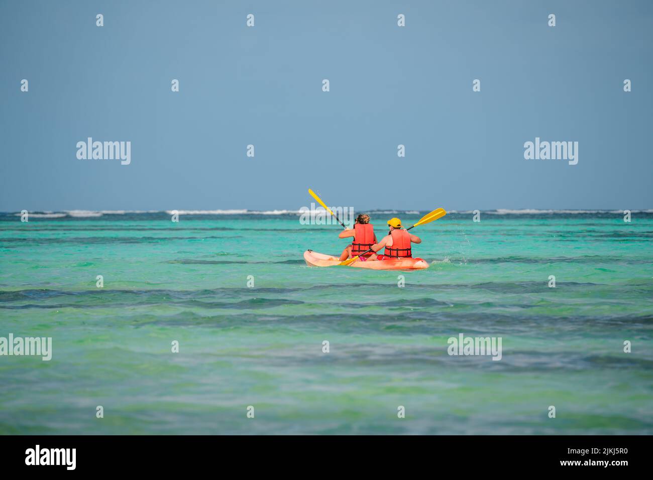 Two people paddle in the ocean with the Kajak in Punta Cana, Dominican ...