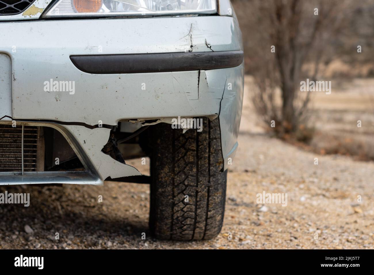 Front of car get damaged by accident on the road Stock Photo - Alamy