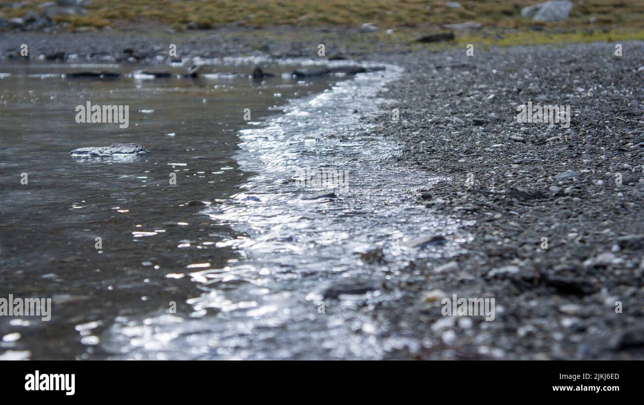 Small waves on coast hi-res stock photography and images - Alamy