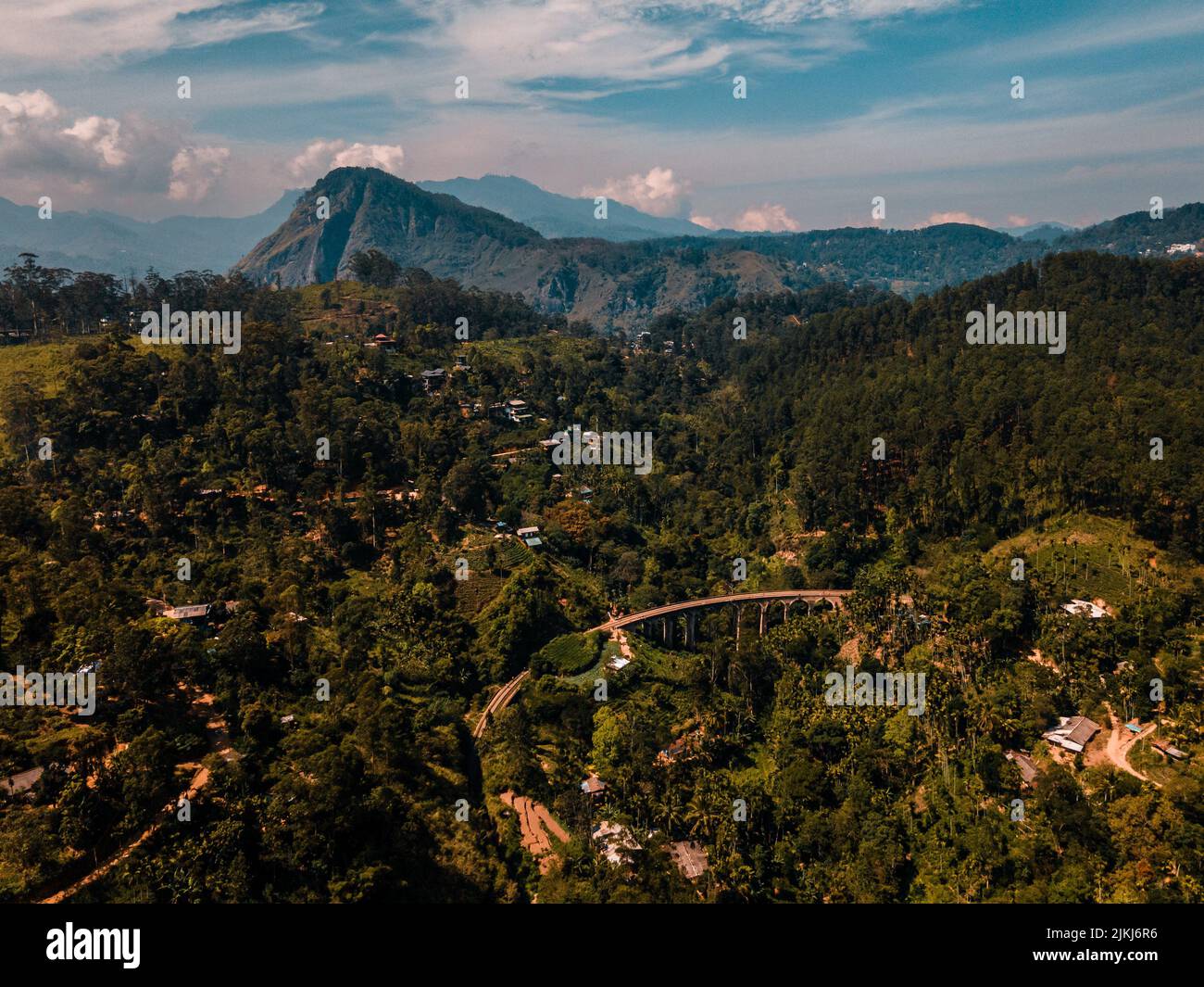 An aerial shot of Sri Lanka Ella Nine Arch Bridge and green nature on a ...