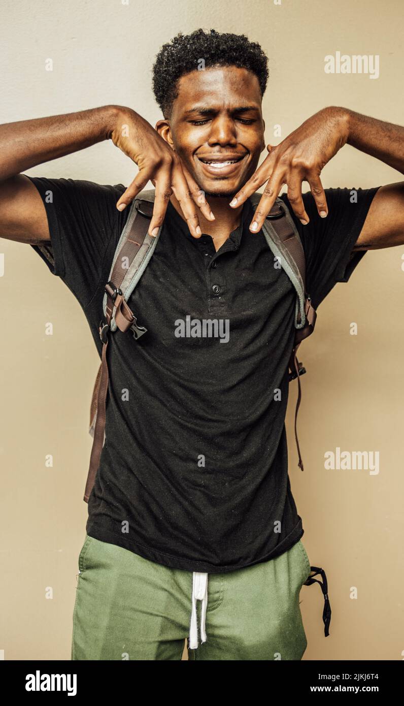 Man backpack african hi-res stock photography and images - Alamy