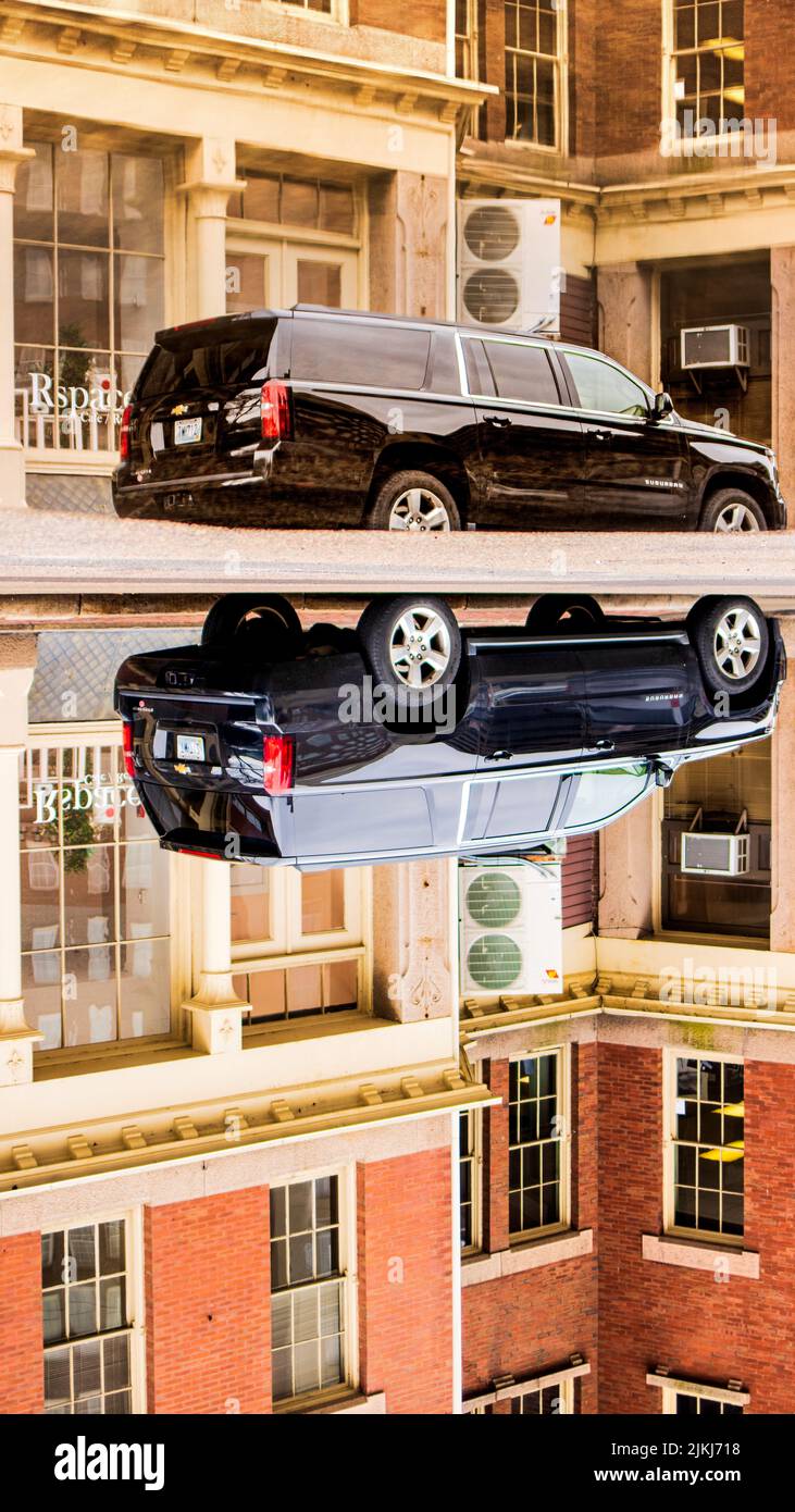The vehicle reflection on a puddle in Providence, Rhode Island Stock ...
