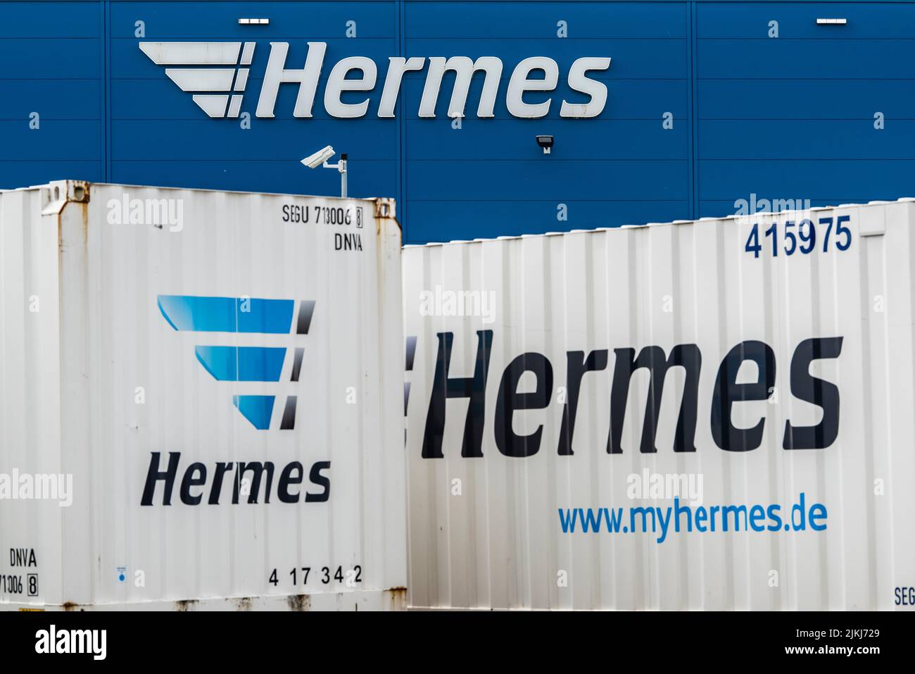 Building and container of Hermes company with writing Stock Photo - Alamy