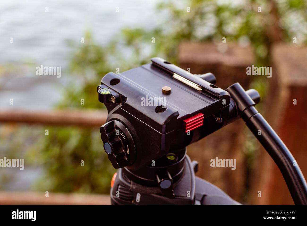 A closeup shot of a camera stand against a blurred background Stock ...