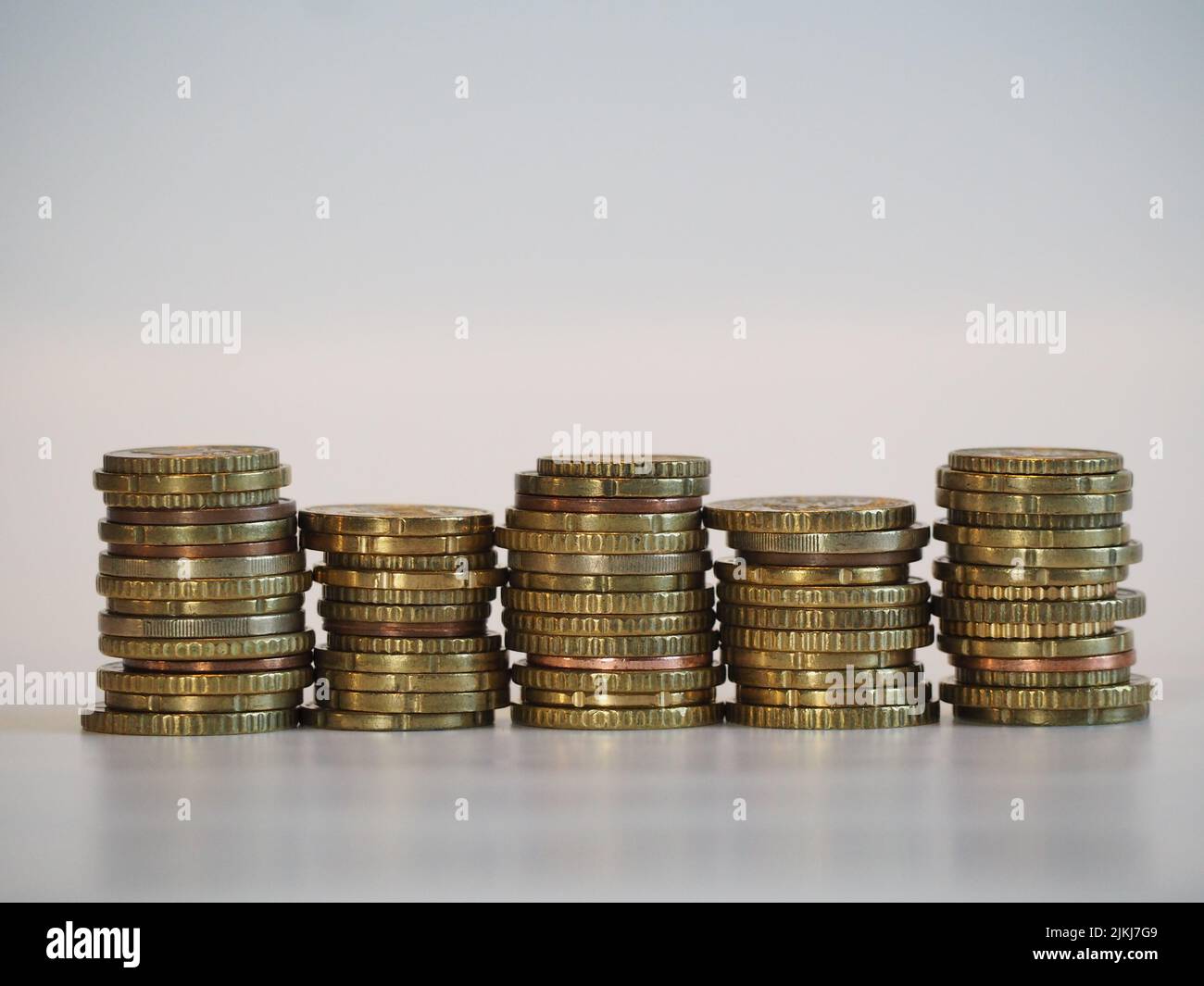 Stacked coins hi-res stock photography and images - Alamy