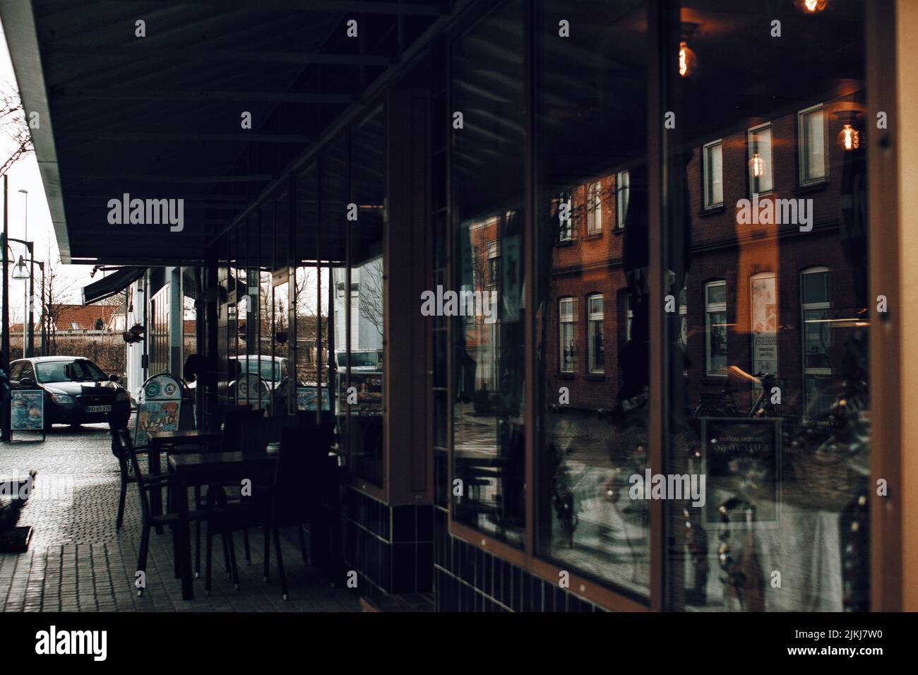 An exterior view of a cafe with reflections in the glass windows Stock ...
