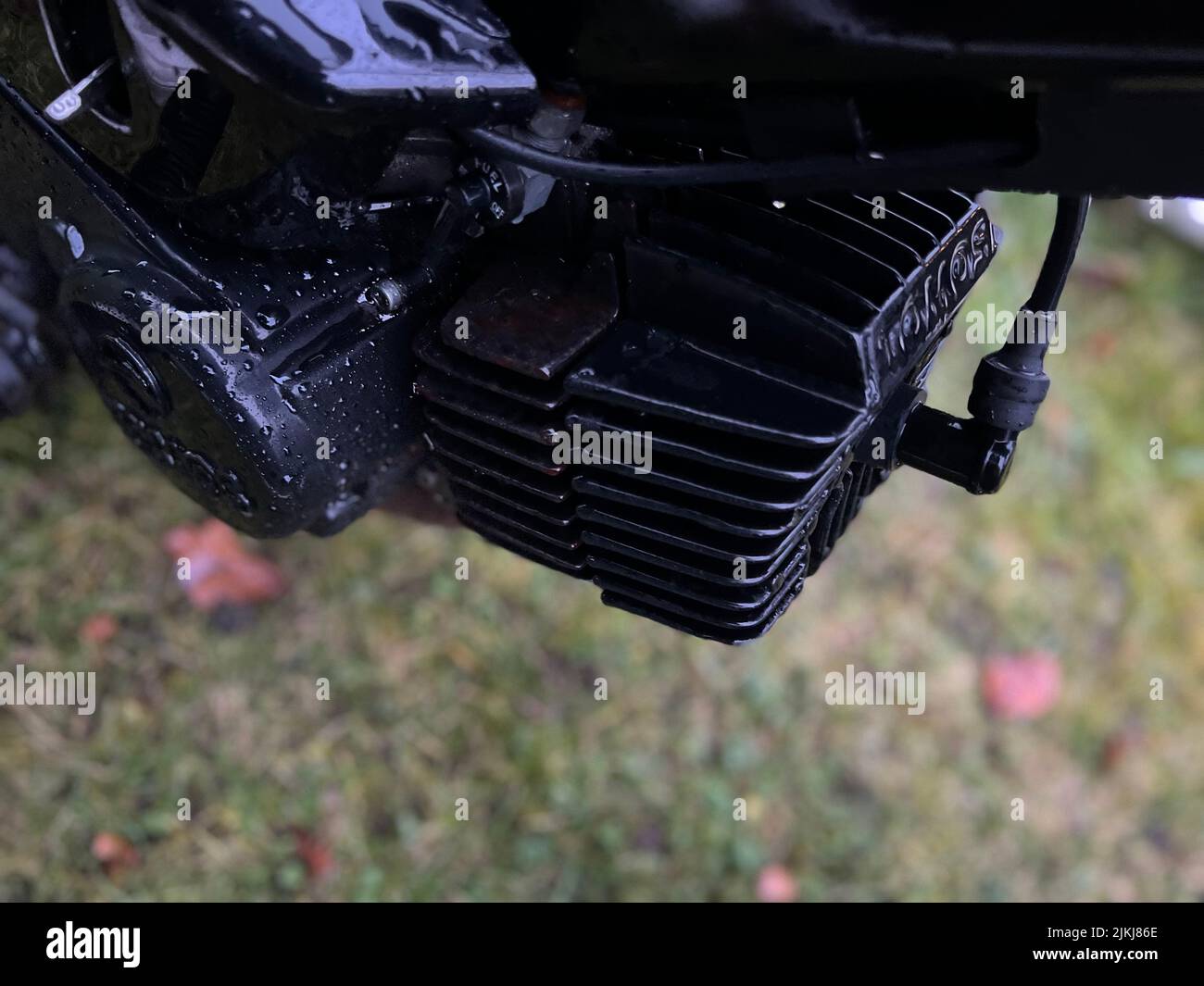 A beautiful Tomos snor scooter recently washed Stock Photo - Alamy