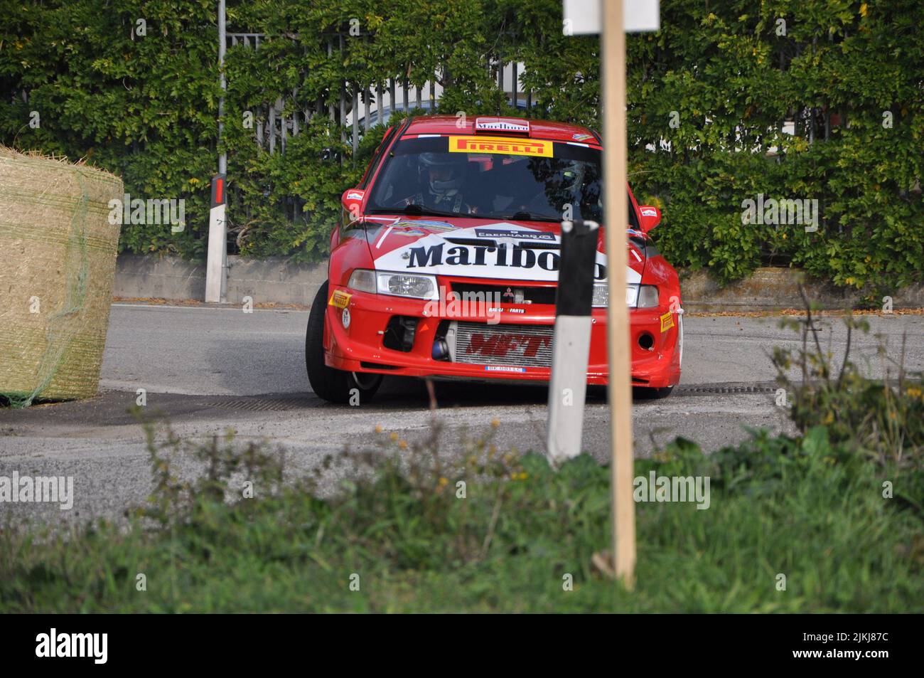 A Mitsubishi Lancer vintage car rally in race Stock Photo - Alamy