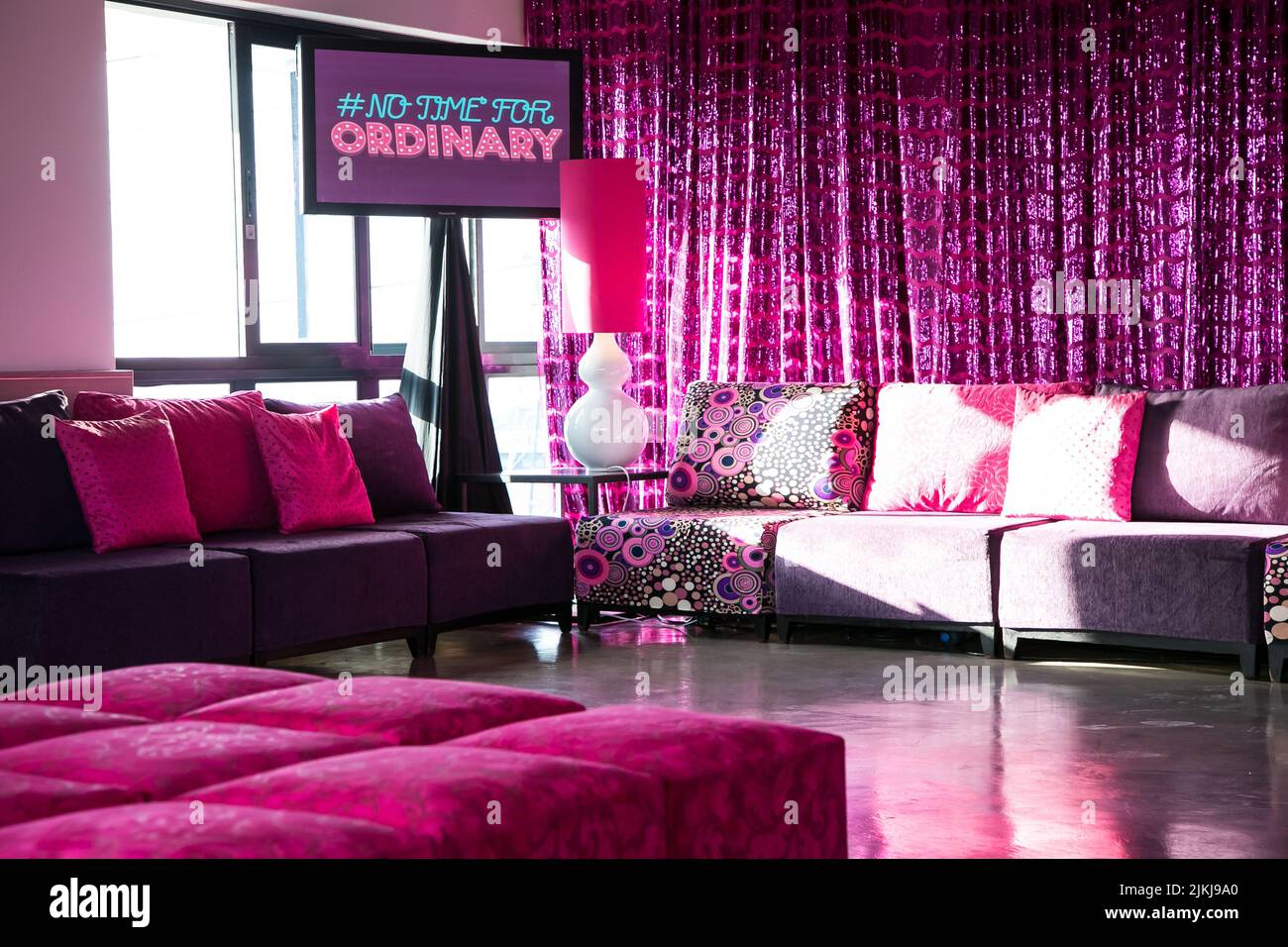 A purple interior design for an indoor media party event Stock Photo ...