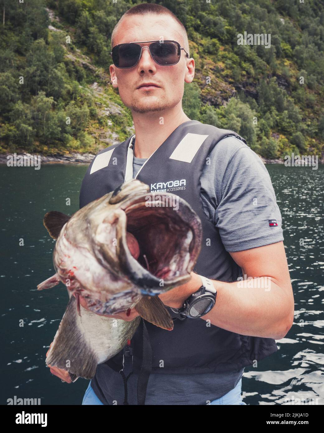 Man holding large fish hi-res stock photography and images - Alamy