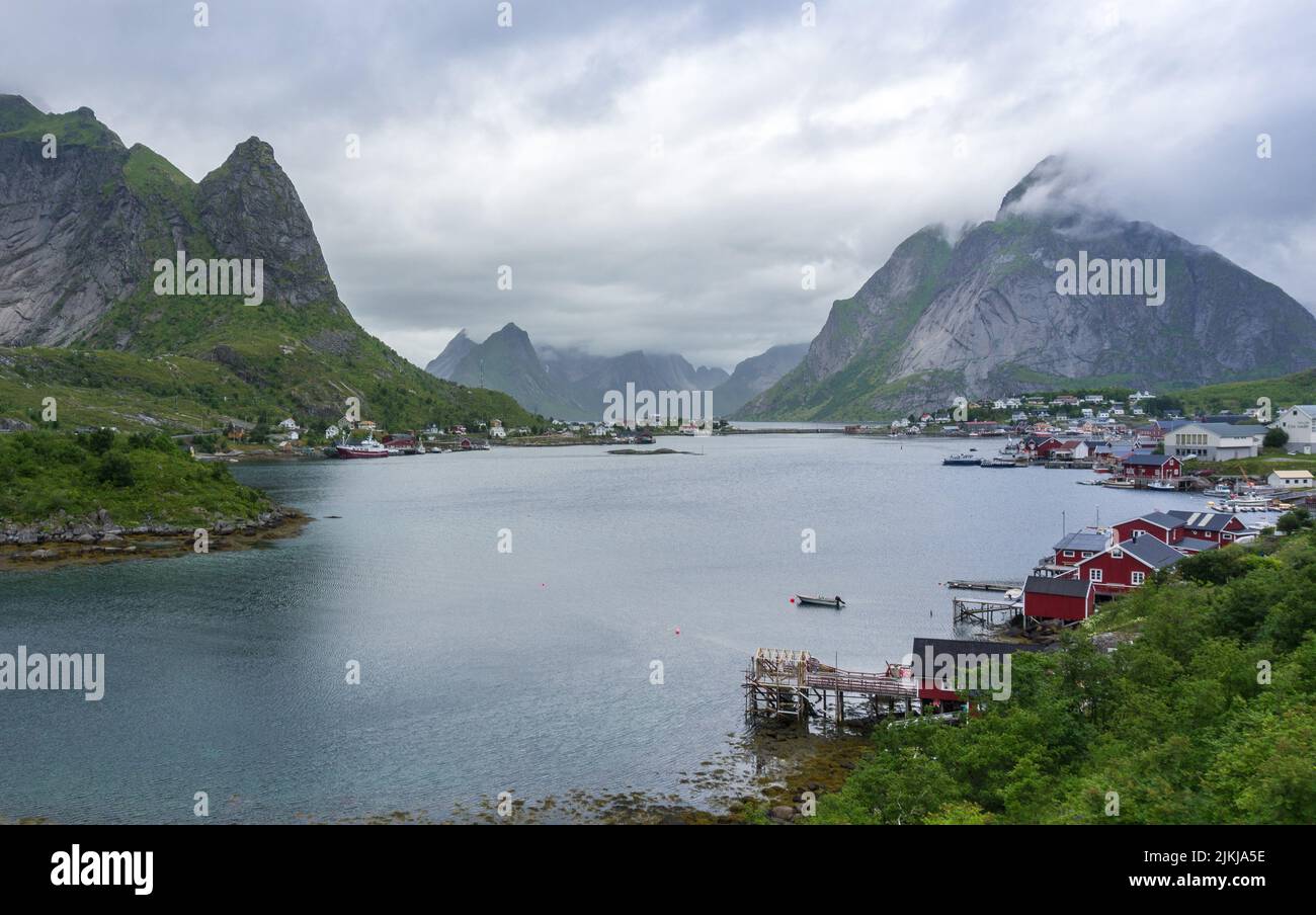 A ocean water surrounding the islands and high mountains in Lofoten ...