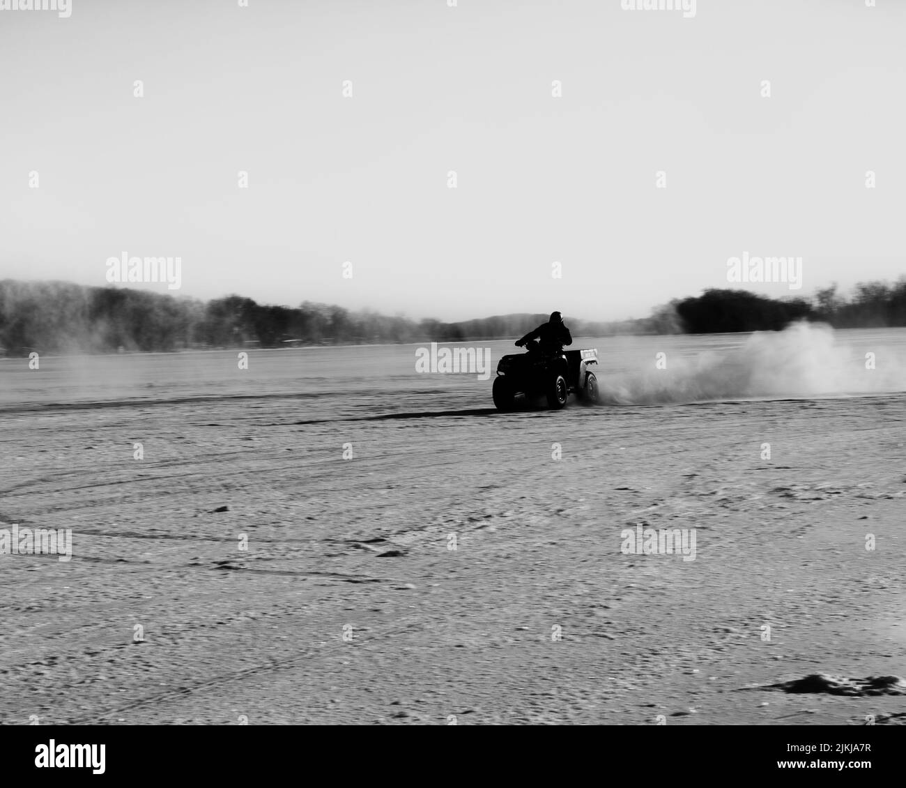 A quad bike drifting on ice and snow in Juneau, Alaska Stock Photo - Alamy