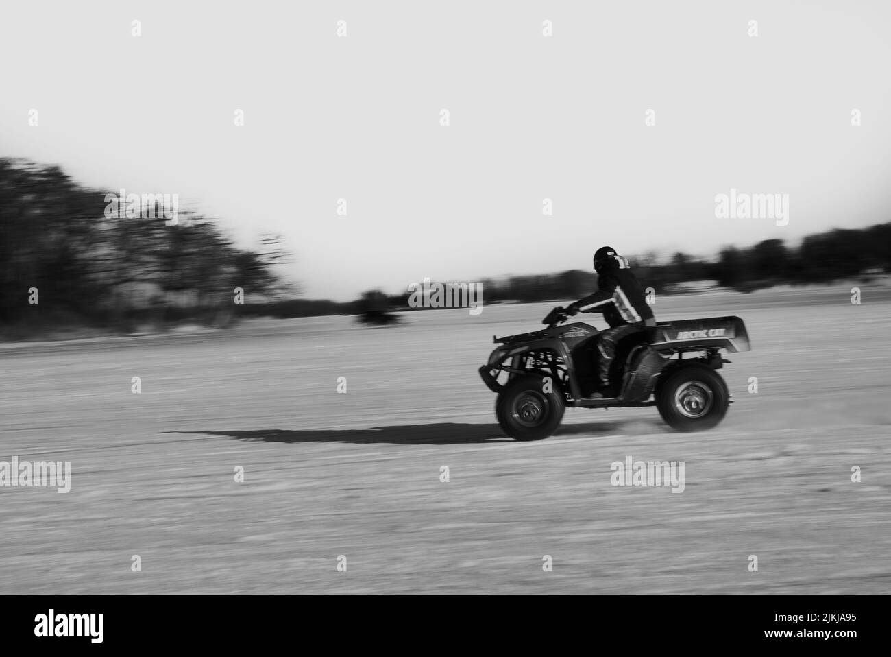 A quad bike drifting on ice and snow in Juneau, Alaska Stock Photo - Alamy