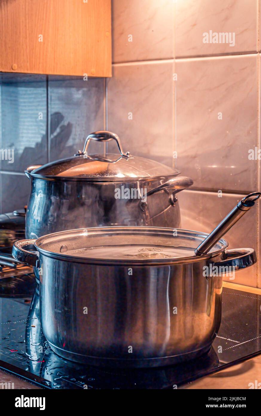 Metal water pot hi-res stock photography and images - Alamy