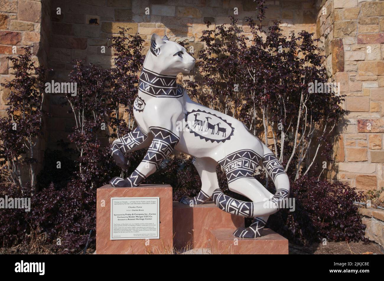 Contemporary Puma cat scultpure painted with ancient designs sits out ...