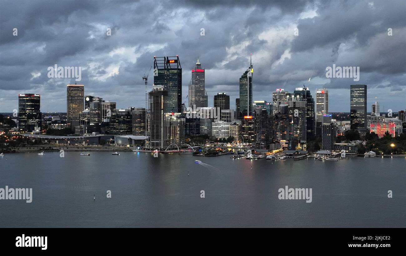 The cloudy gloomy sky over Perth in Western Australia with Swan River ...
