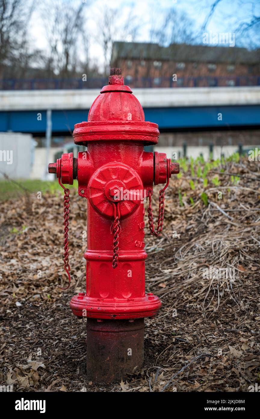 A vertical shot of a red metal water hydrant Stock Photo - Alamy